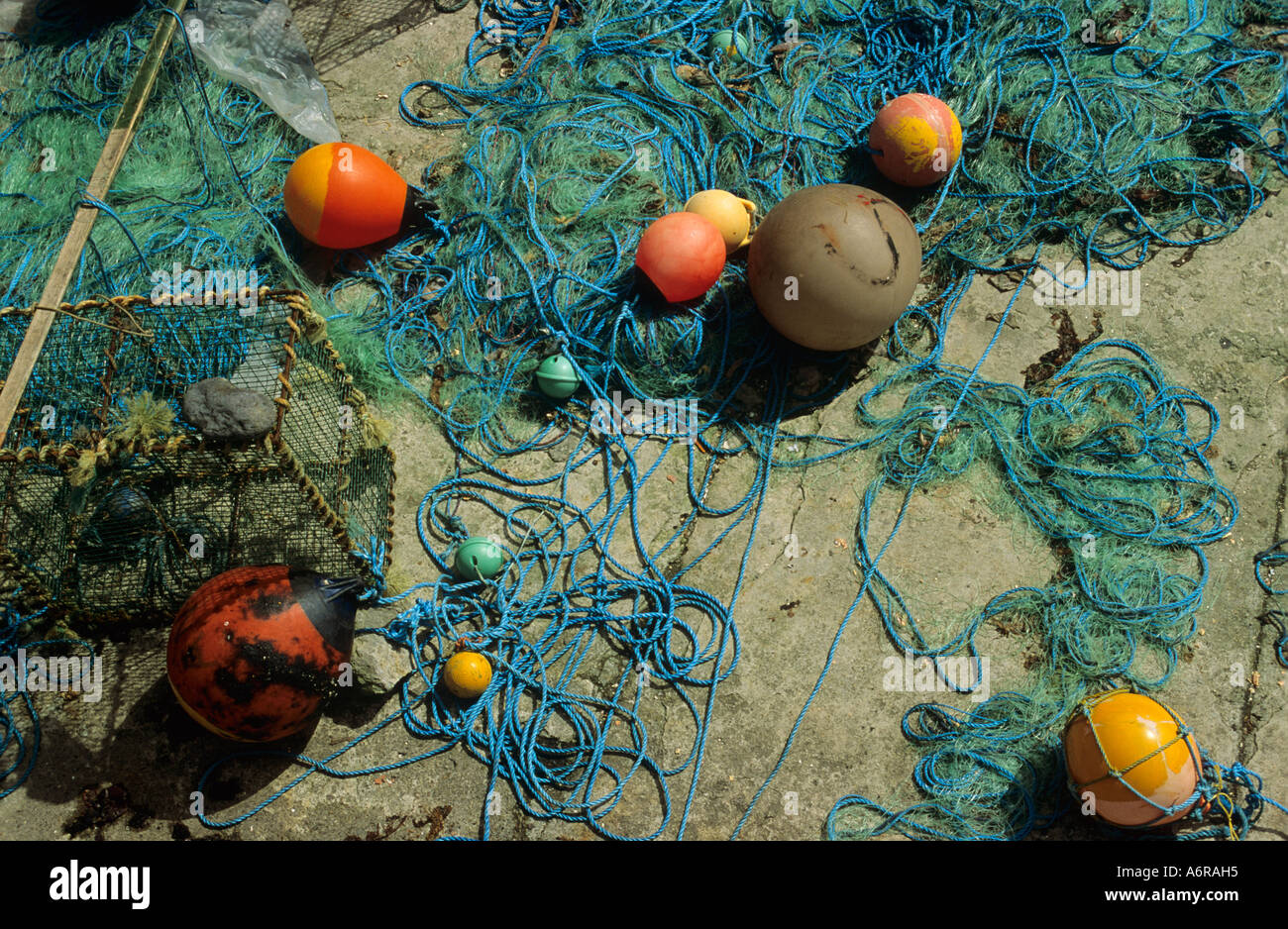 Fishing nets and floats Stock Photo - Alamy