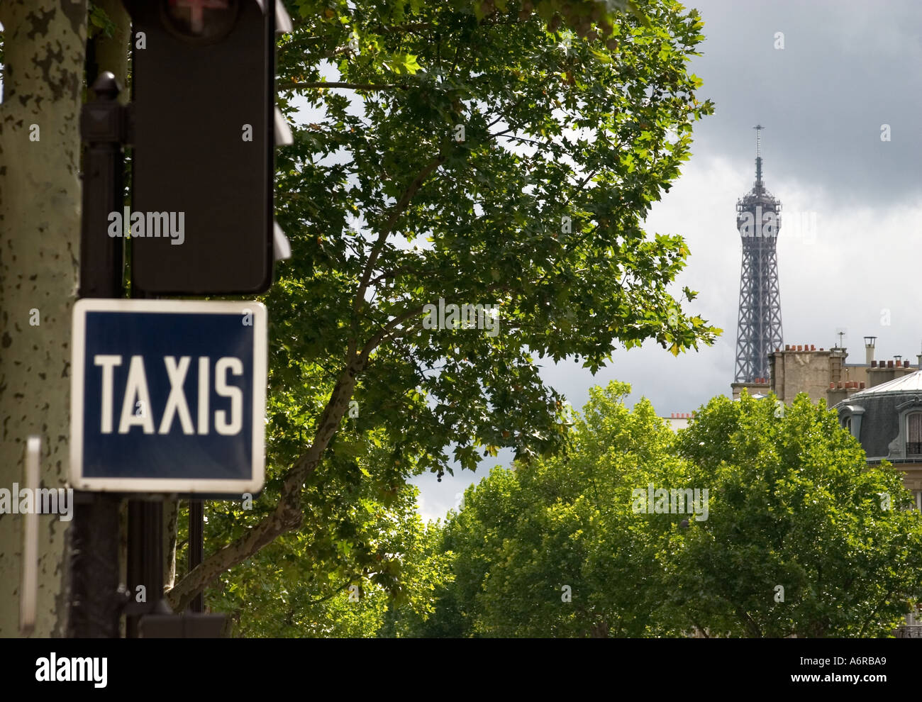 Taxi sign in foreground Eiffel Tower in the distance Paris France ...