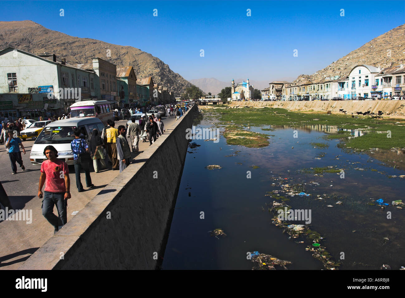 AFGHANISTAN Central Kabul People walk alongside polluted Kabul river ...