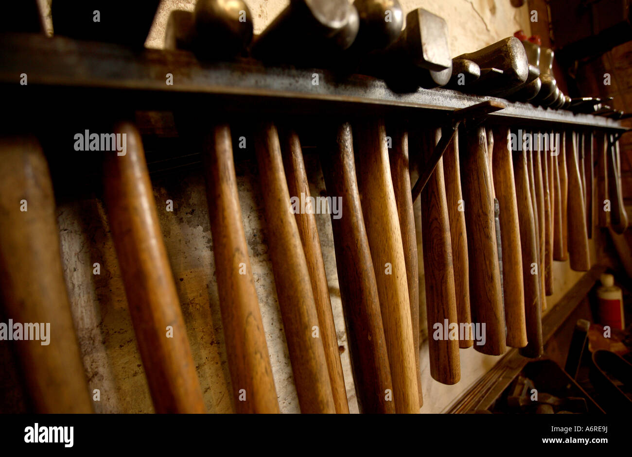 A rack of Hammers belonging to a Blacksmith Stock Photo - Alamy