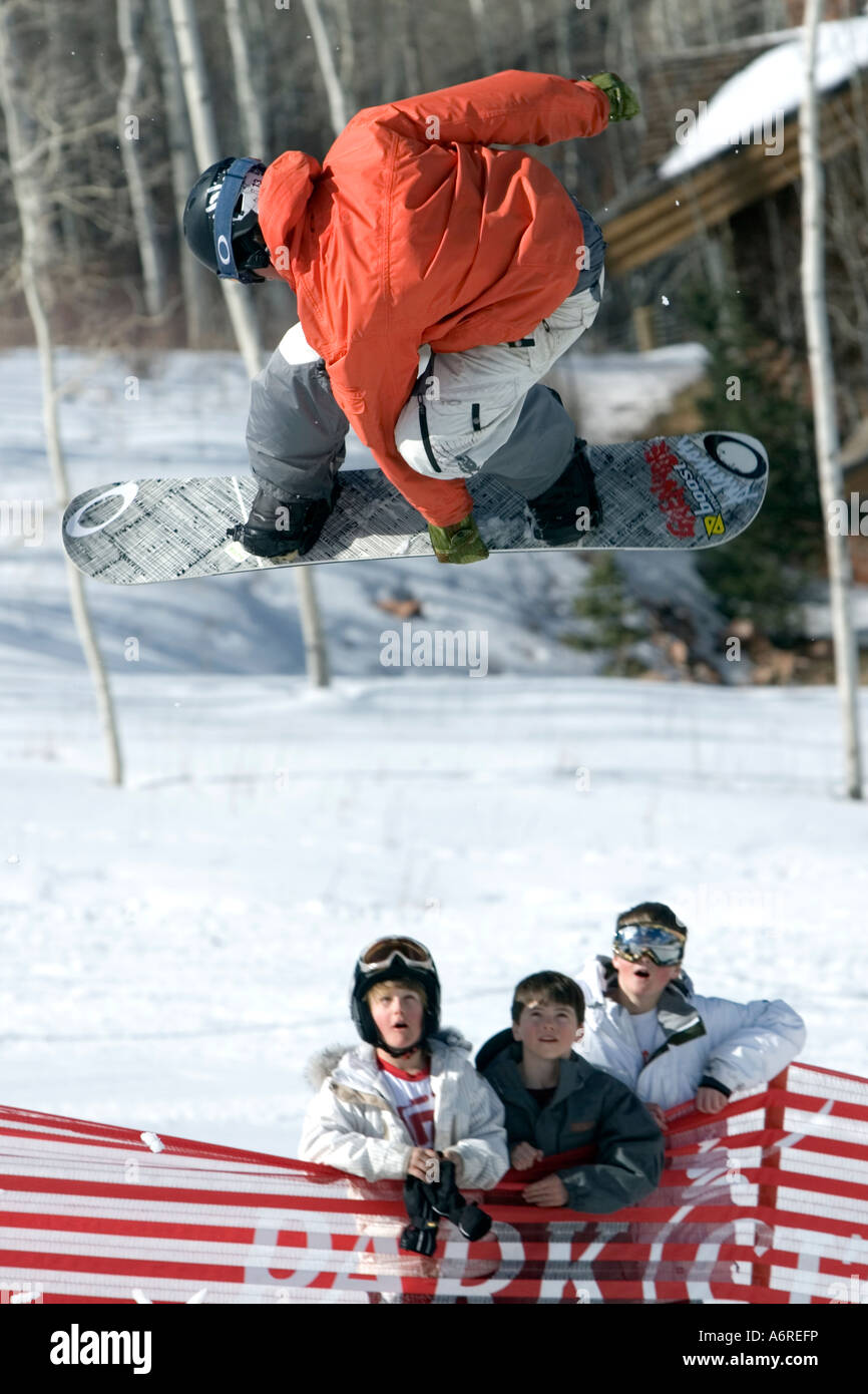 Ski superpipe with three boys watching with mouths open in awe Park ...
