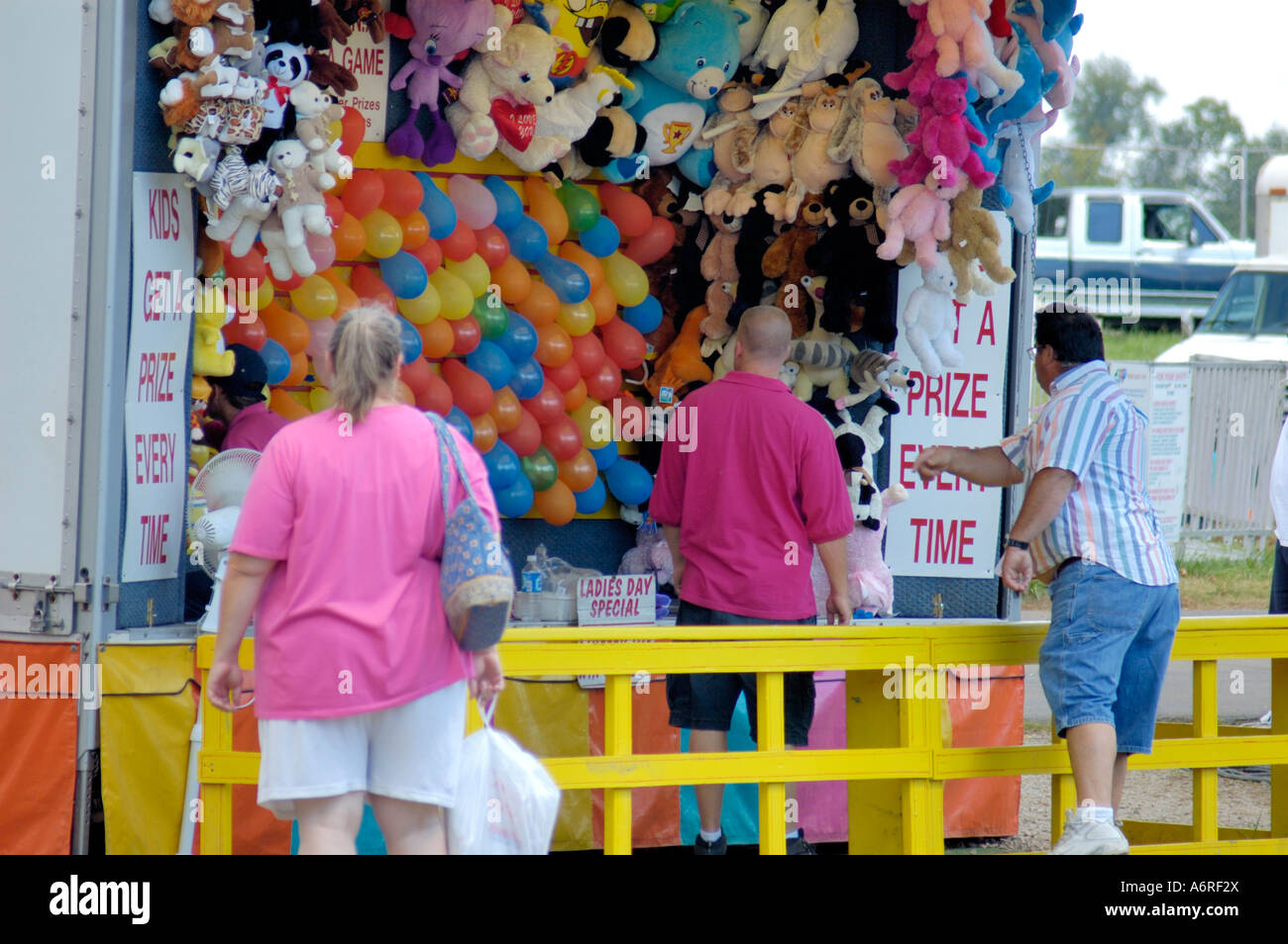 Colorful carnival midway Stock Photo - Alamy