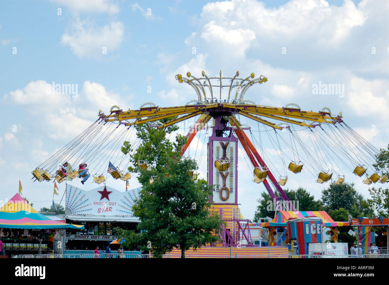 Swings at a carnival Stock Photo - Alamy