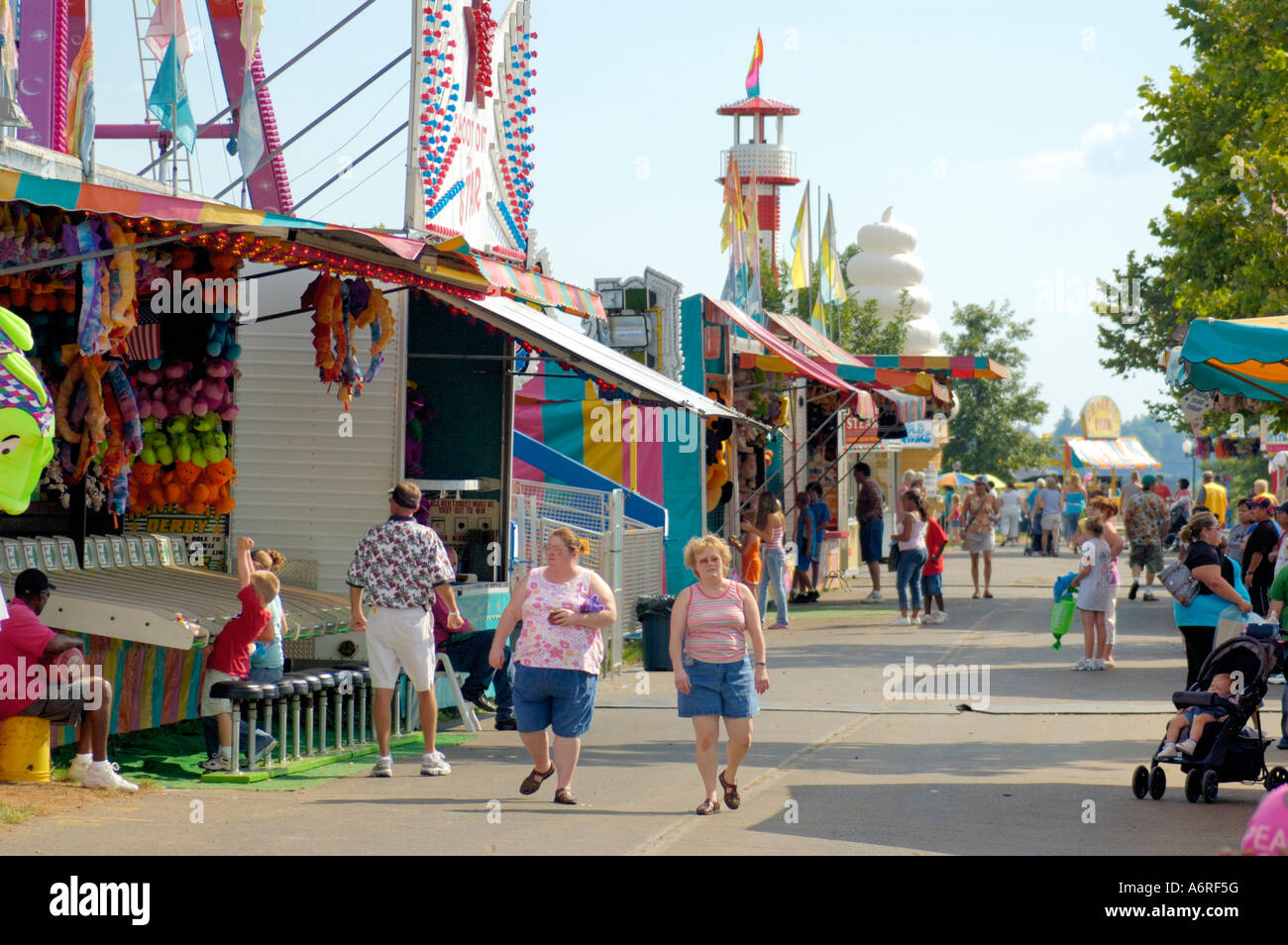 Colorful carnival midway Stock Photo - Alamy
