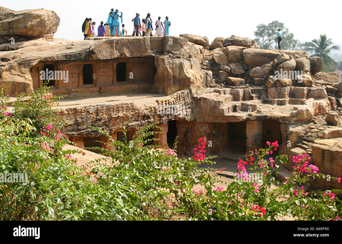 colorful visitors enjoy an Overview of the famous Udaigiri Caves near ...