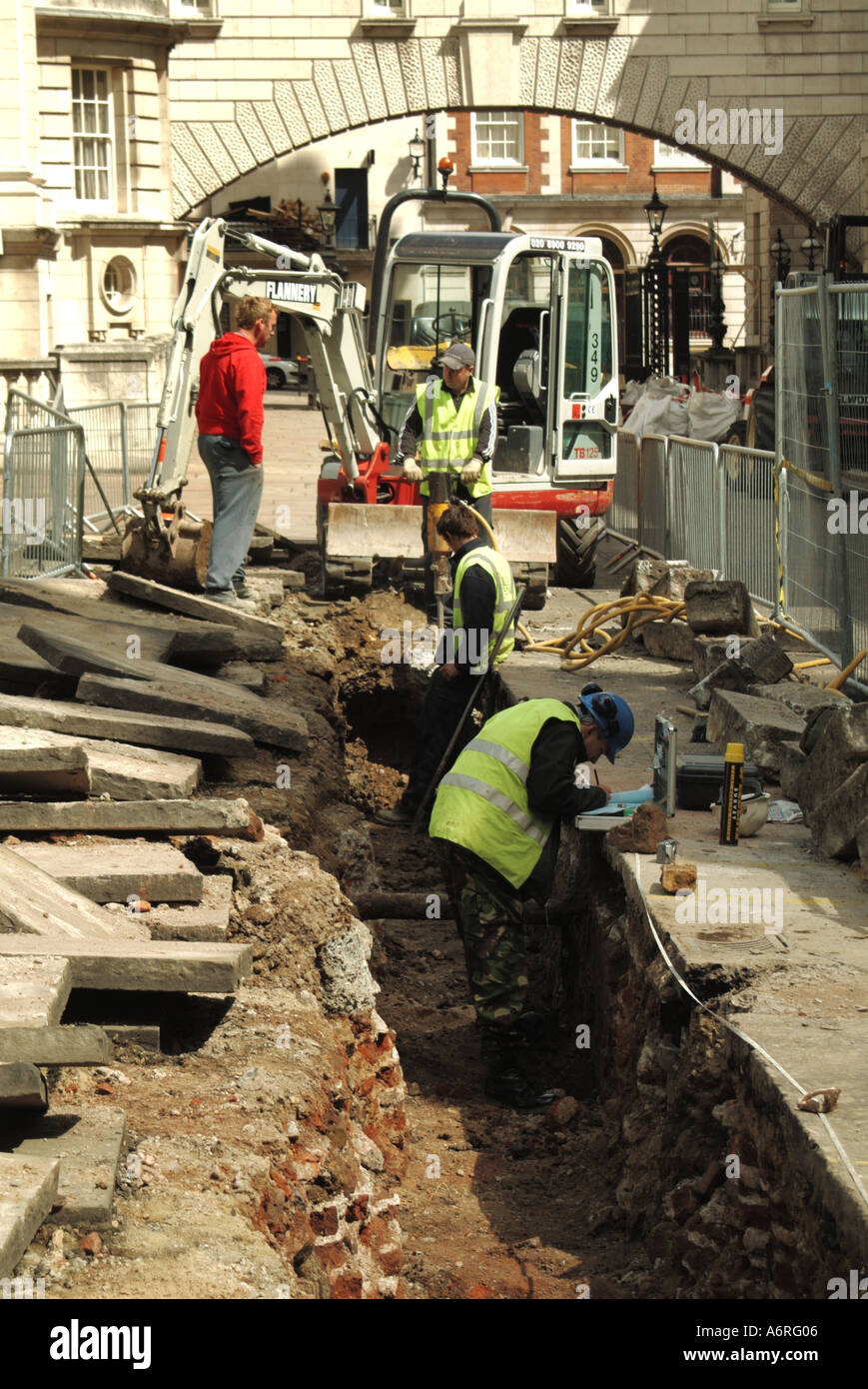 Exterior construction excavator in trench hi-res stock photography and ...