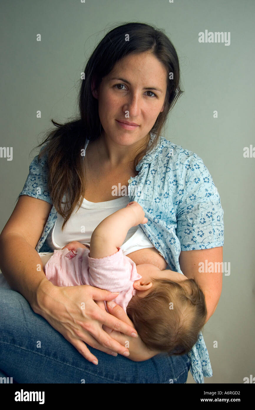 women breastfeeding her baby Stock Photo - Alamy