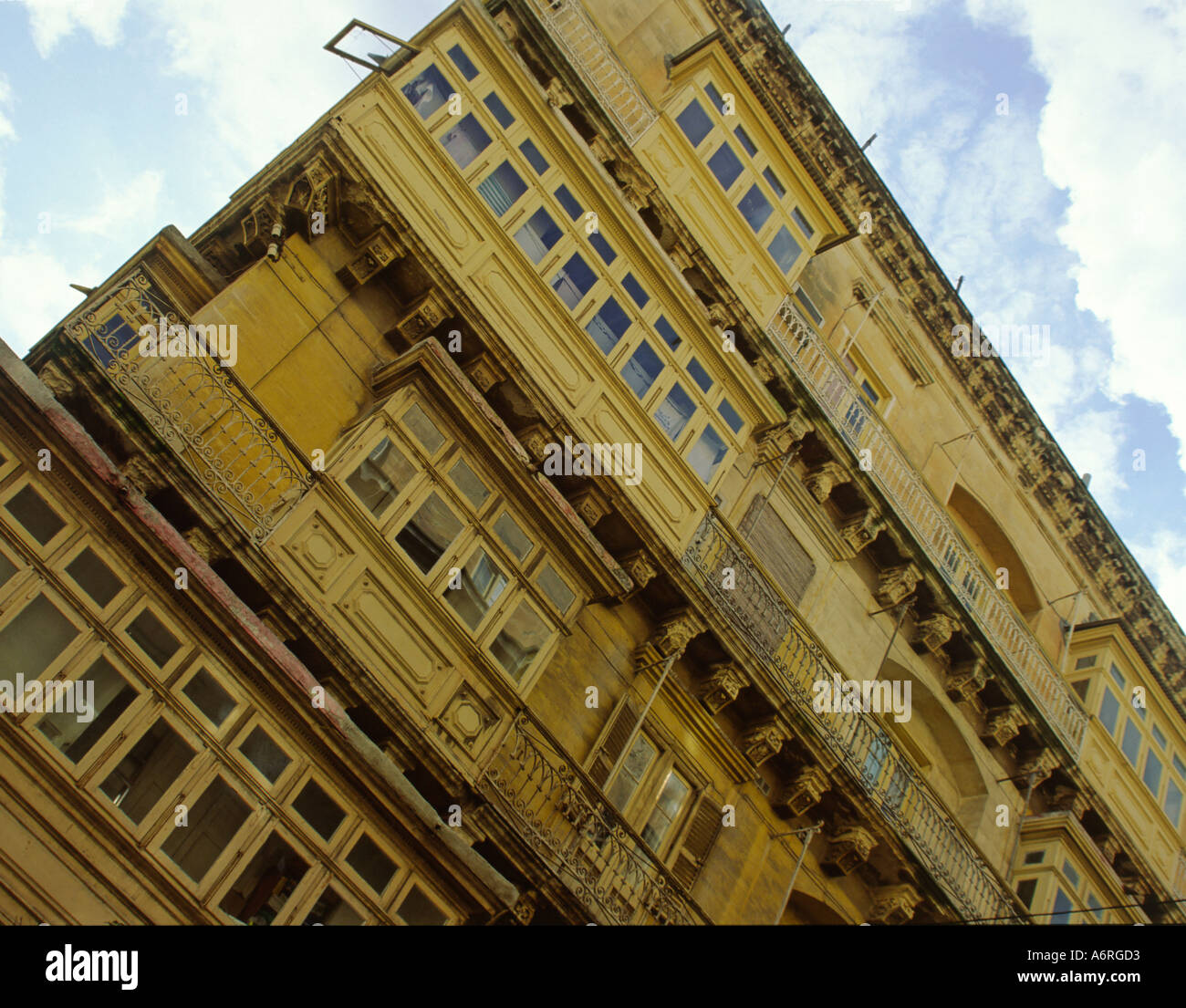 Typical Maltese balcony windows built on to the front of old houses in ...
