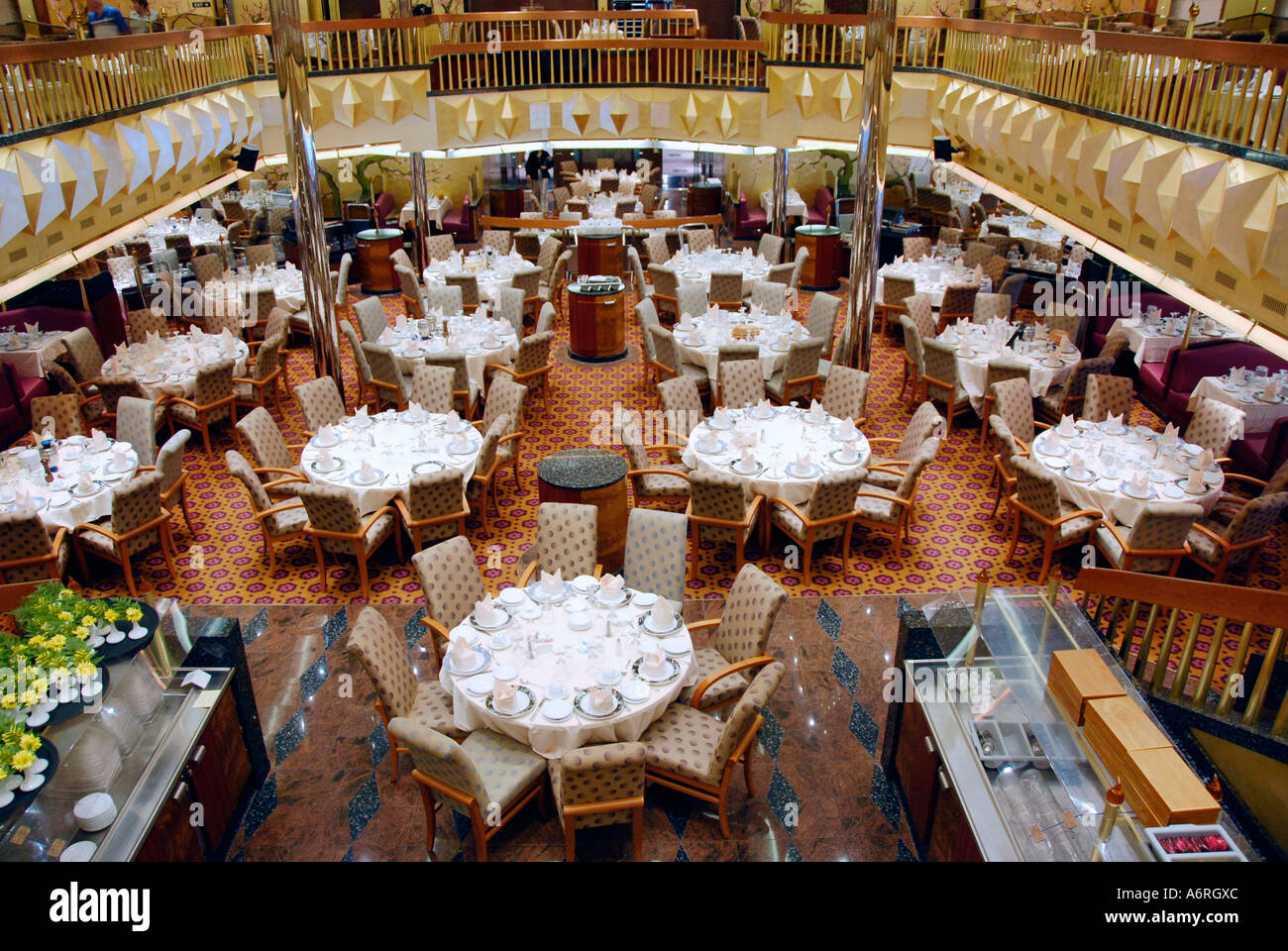 Dining room with prepared tables aboard the Cruise Ship Stock Photo - Alamy