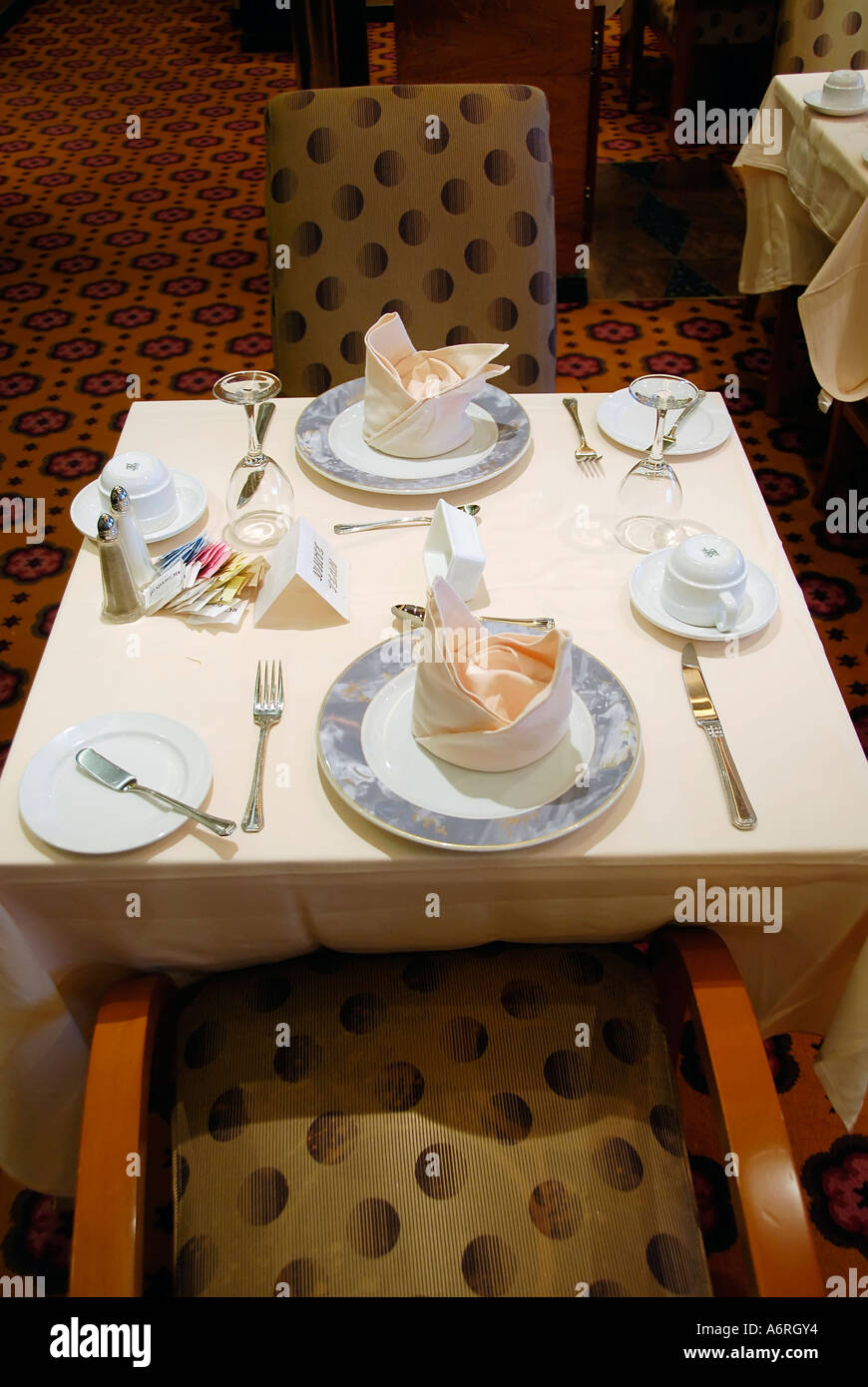 Dining room with prepared tables aboard the Cruise Ship Stock Photo - Alamy