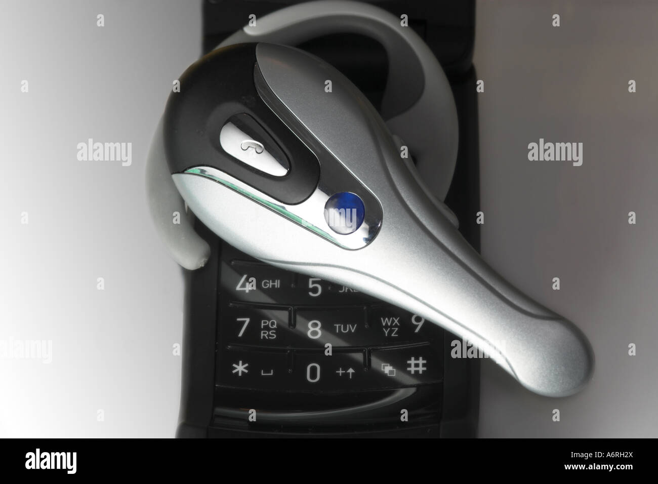 cellphone with headphone (bluetooth Stock Photo - Alamy