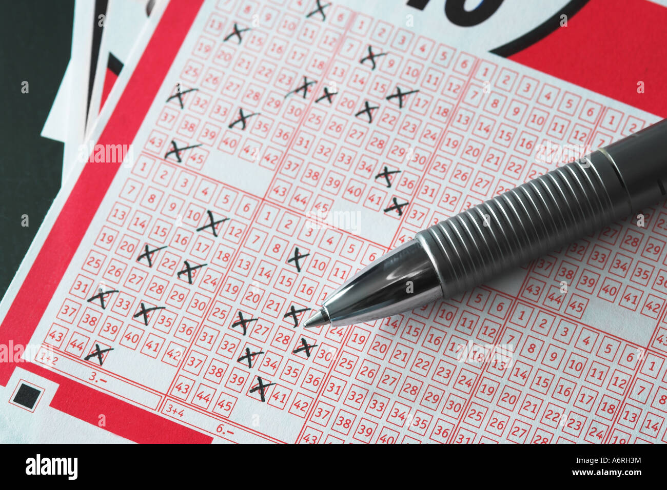 Lottery ticket with a pen Stock Photo - Alamy