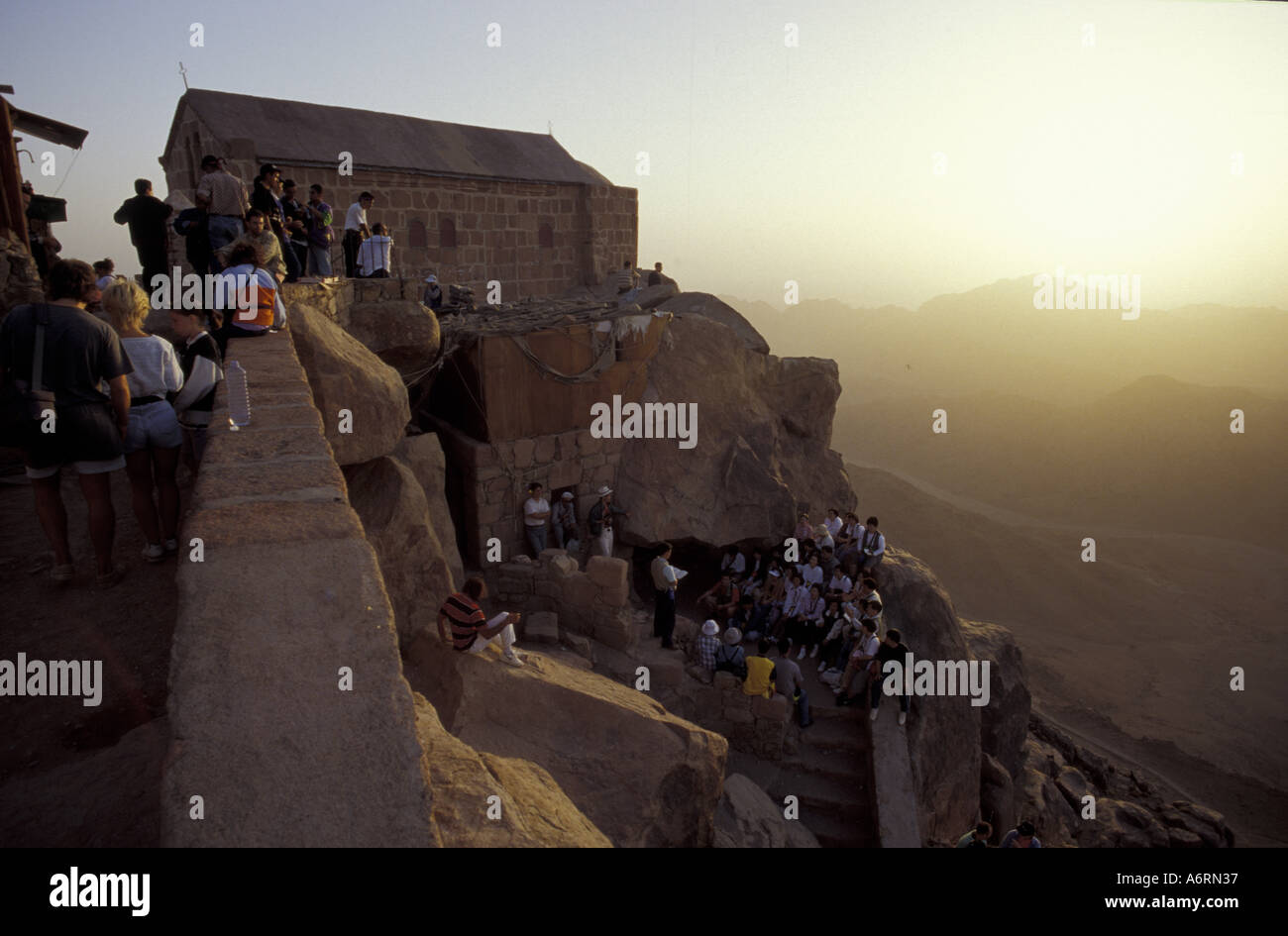 Africa, Egypt, Sinai, Gebel Musa. Tourists in sunrise light Stock Photo ...