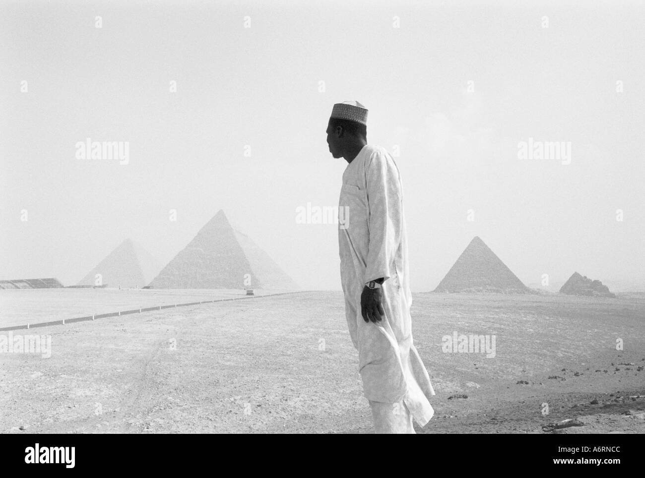 Cairo Egypt, White Robed Man at Giza Pyramids (MR Stock Photo - Alamy