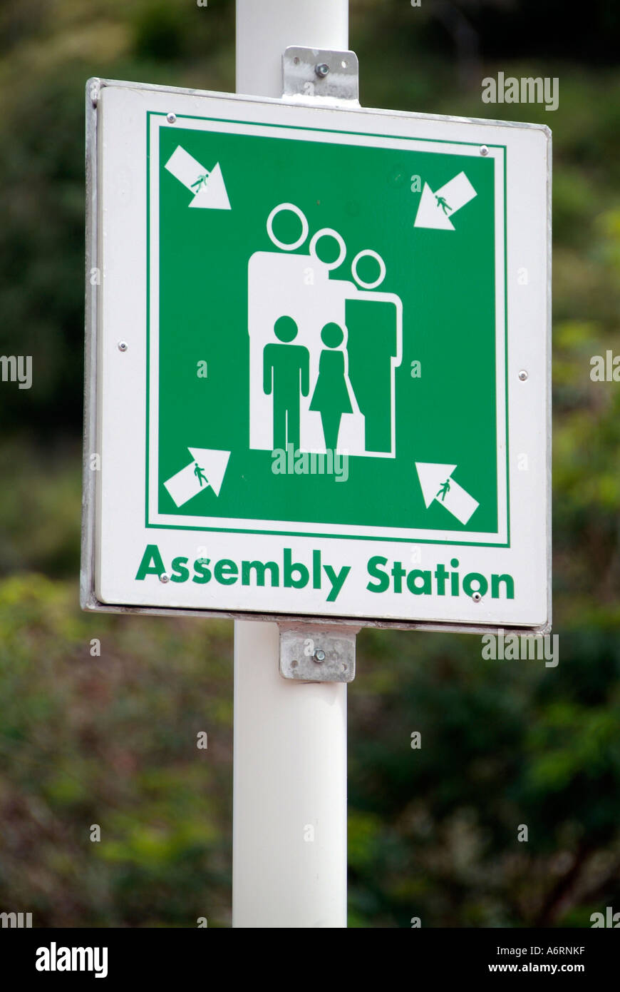 Sign pointing to an assembly station where people can meet if they get ...