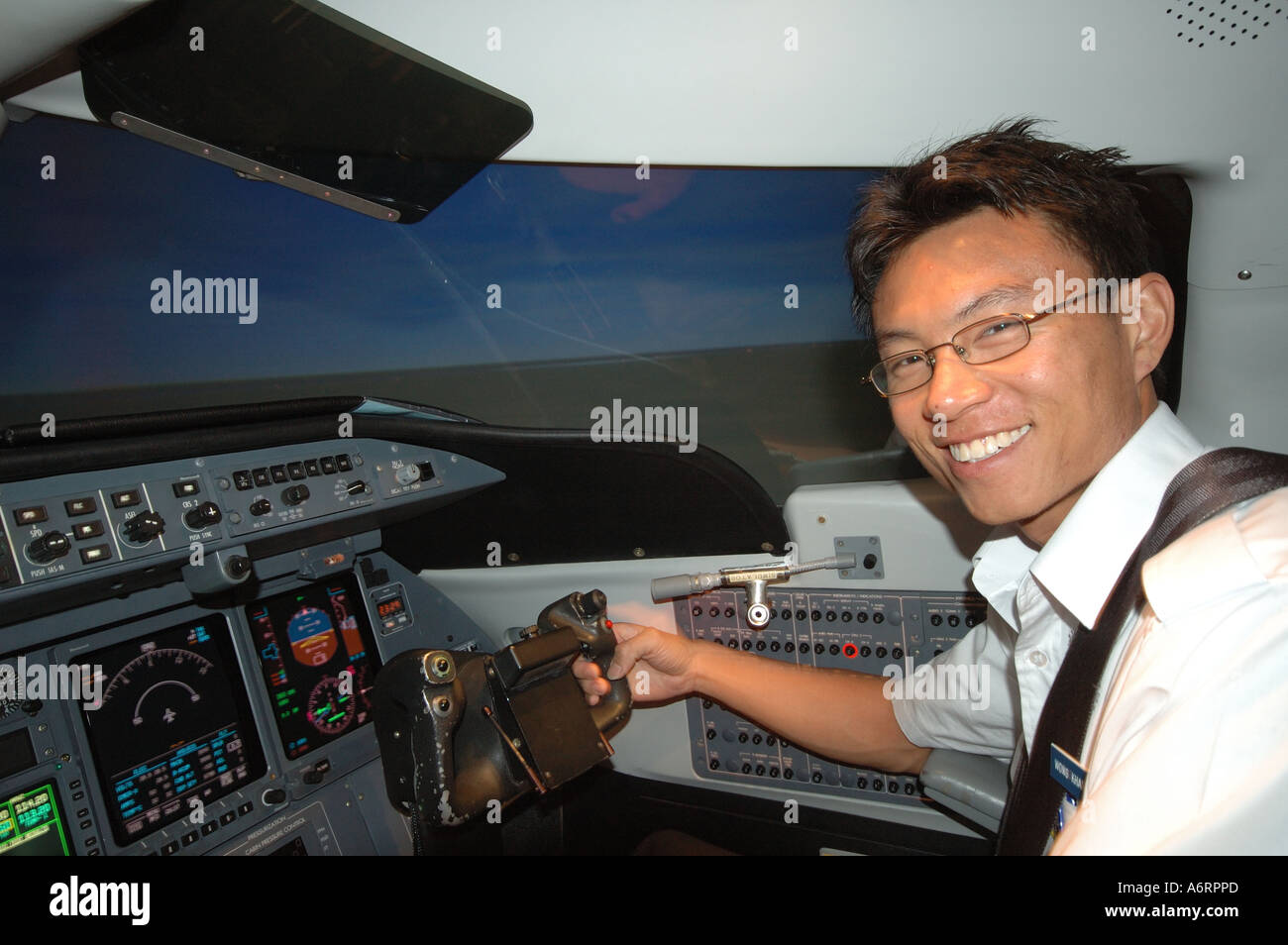 Trainee Pilot in cockpit simulator for commercial passenger jet Stock ...