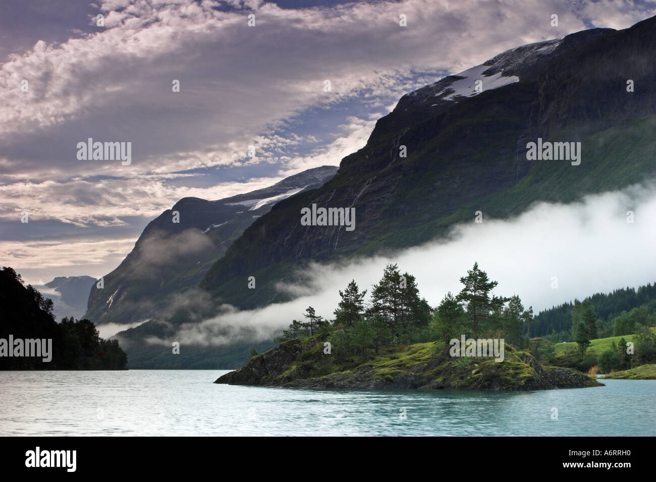 Misty morning at Loenvatnet Lake in the Norwegian fjords, Norway Stock ...