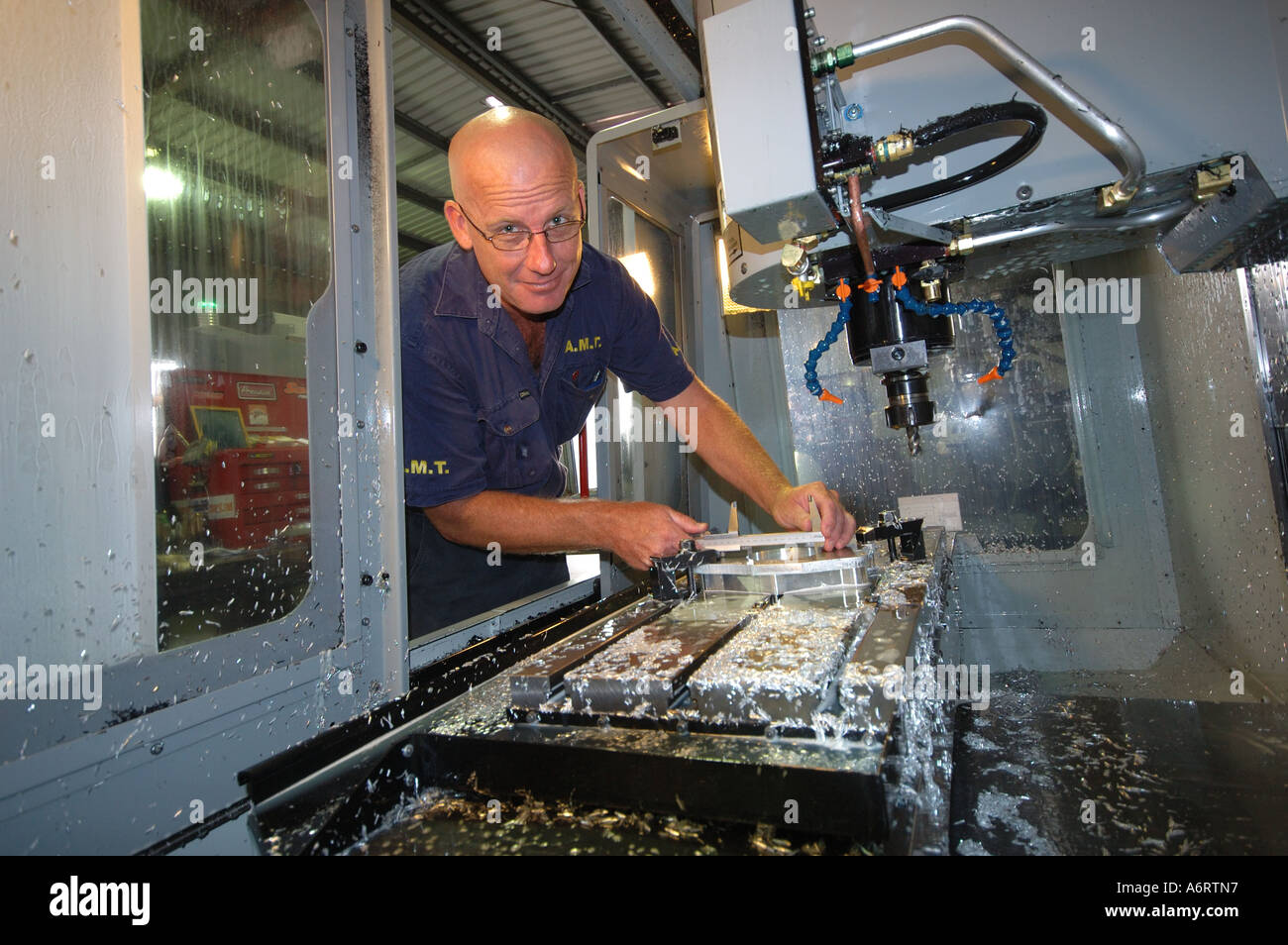 portrait of worker with milling machine Stock Photo - Alamy