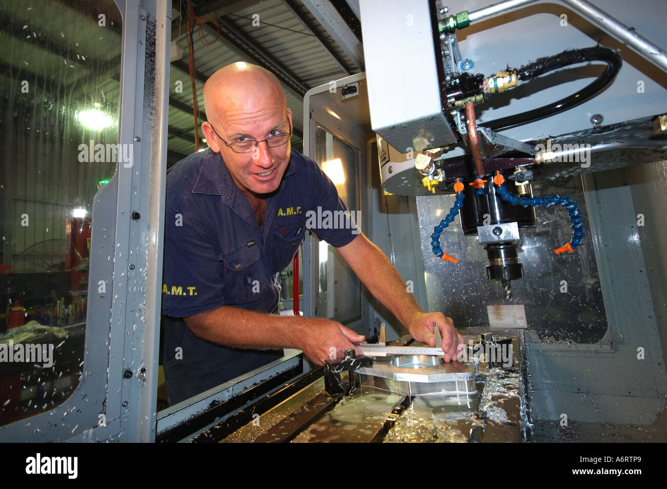 portrait of worker with milling machine Stock Photo - Alamy