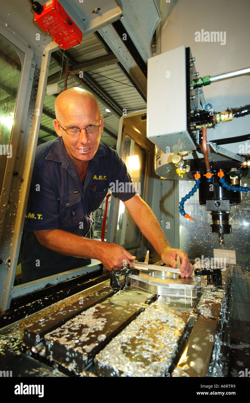 portrait of worker with milling machine Stock Photo - Alamy