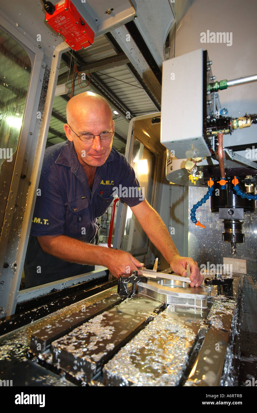 portrait of worker with milling machine Stock Photo - Alamy