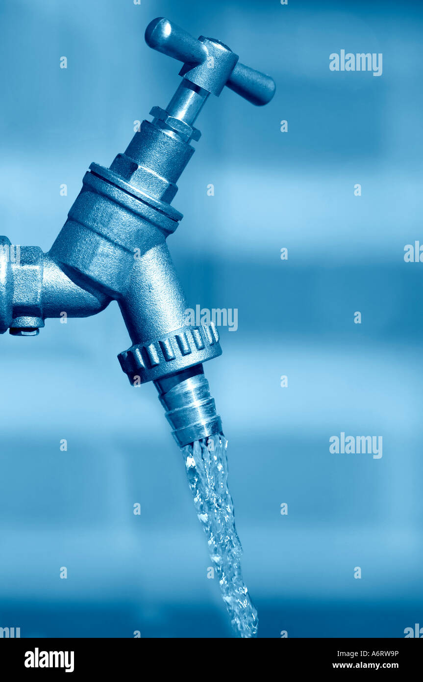 Brass garden Tap with running water Stock Photo - Alamy