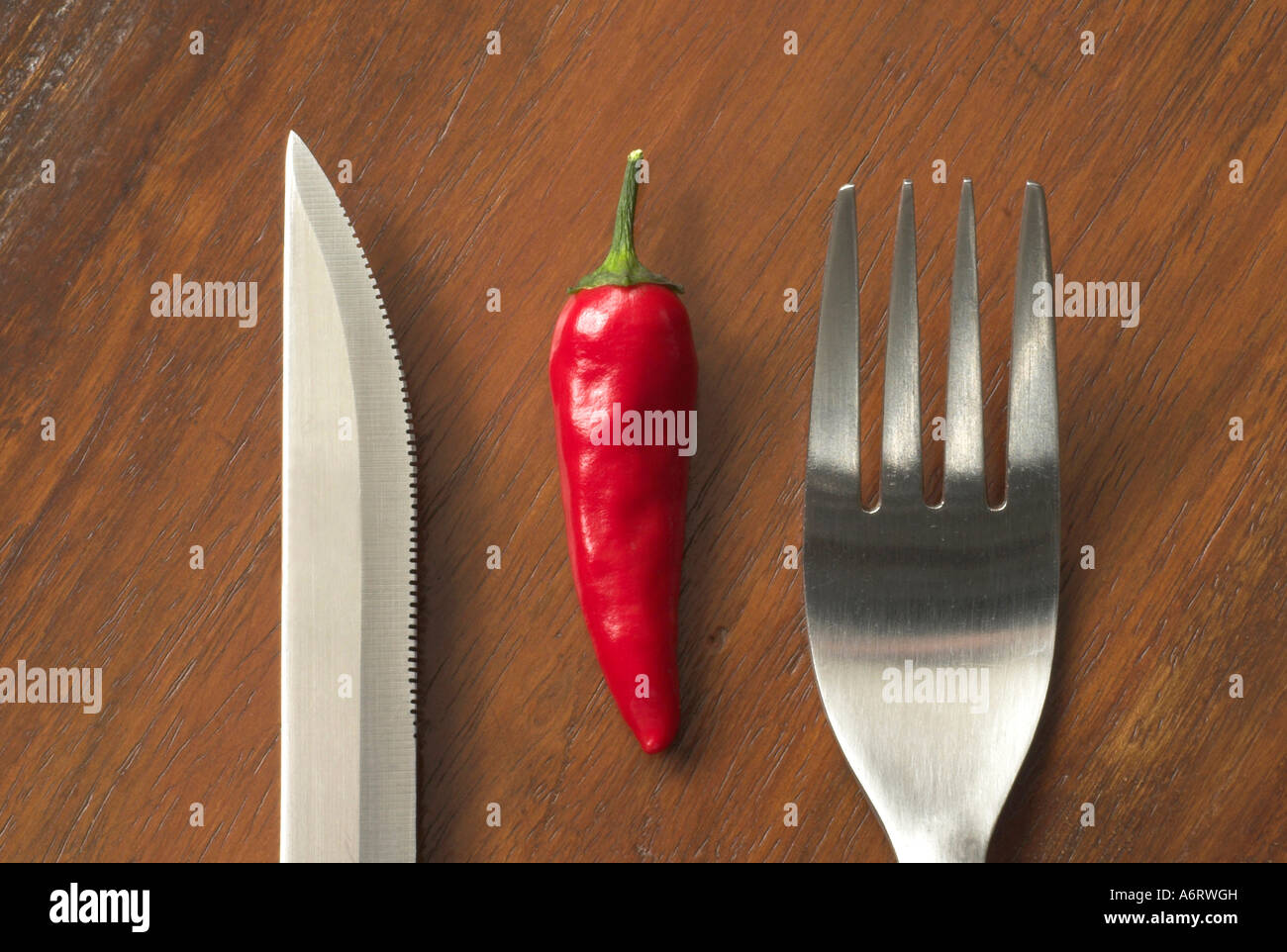 Chilli pepper with knife and fork variety Apache F1 hybrid Stock Photo ...