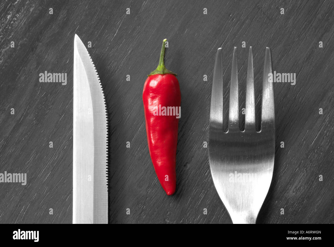 Black and white combination image of Chilli pepper with knife and fork ...