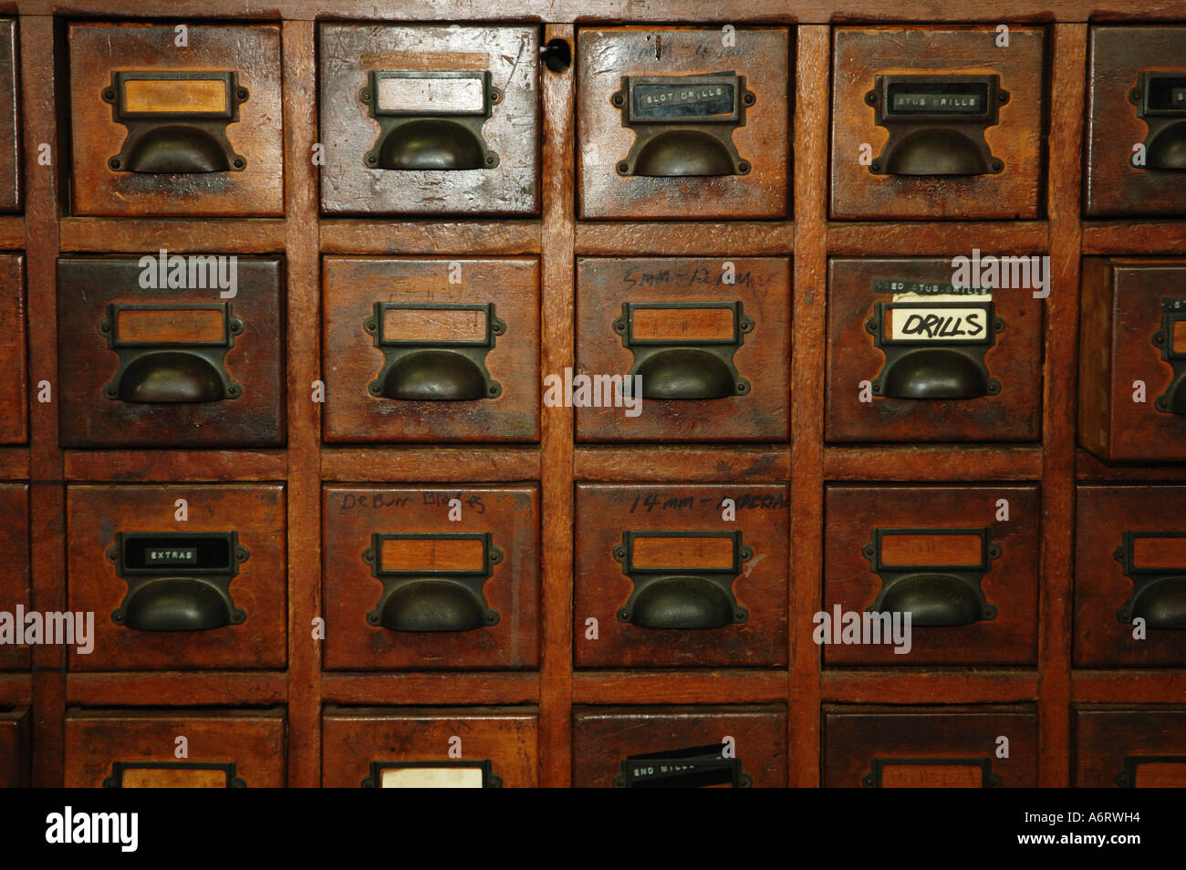 old timber card file cabinet used for tool storage Stock Photo - Alamy