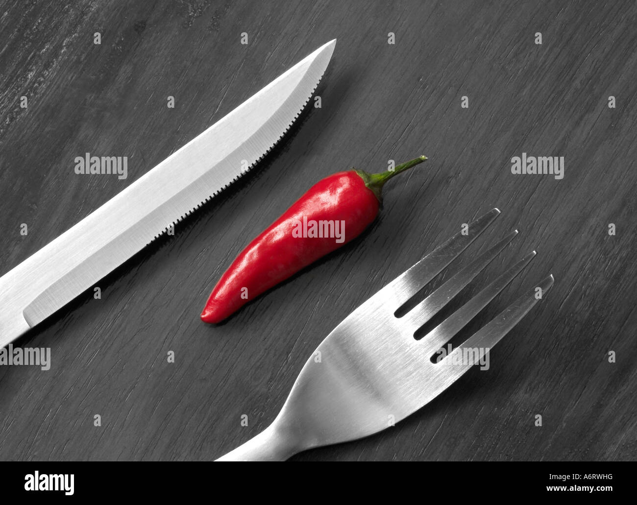 Black and white combination image of Chilli pepper with knife and fork ...