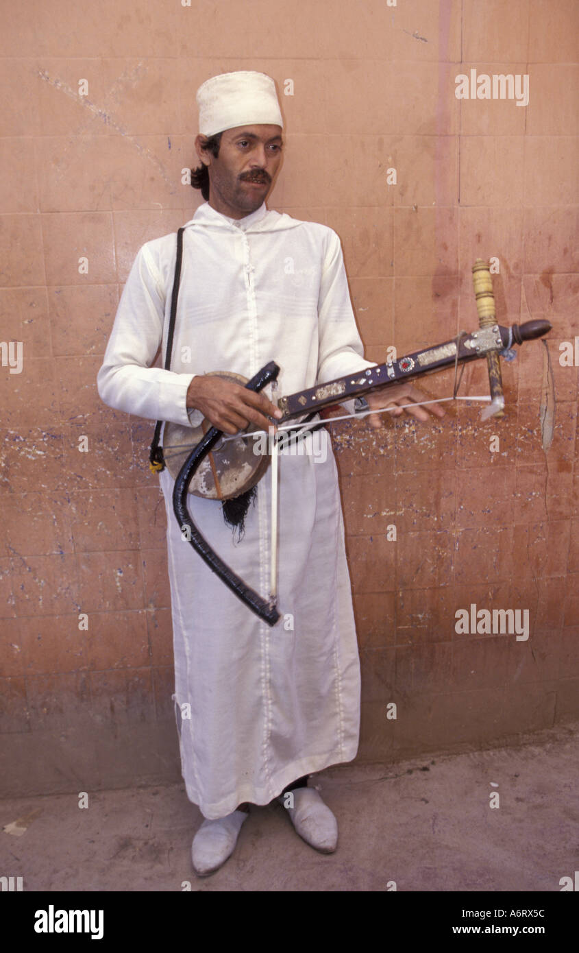 Africa, Morocco, Taroudannt Man playing traditional Berber amzhad ...