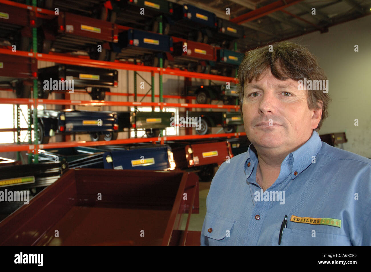 manager in box trailer factory Stock Photo - Alamy