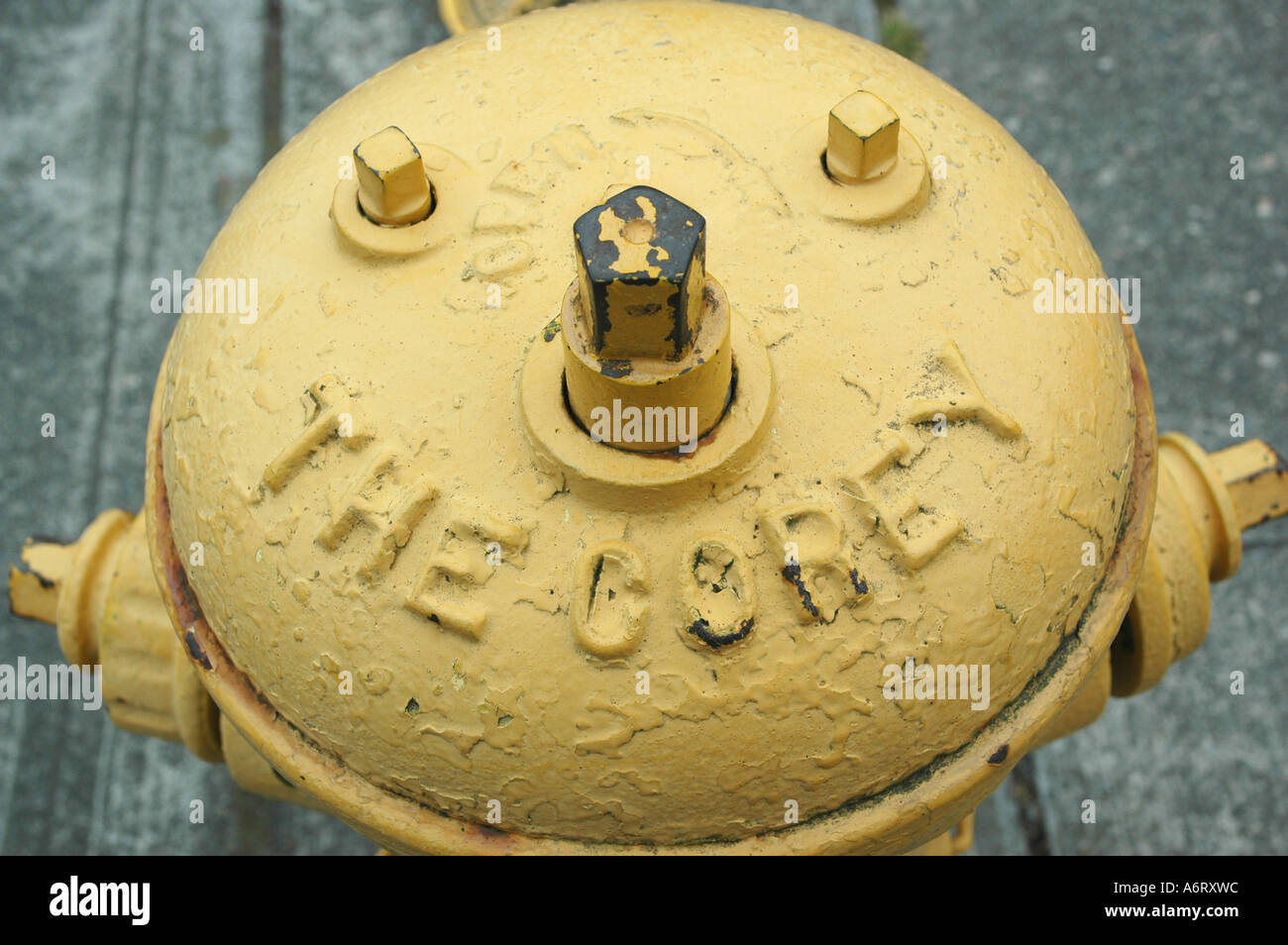 The Top Of A Yellow Fire Hydrant Stock Photo - Alamy