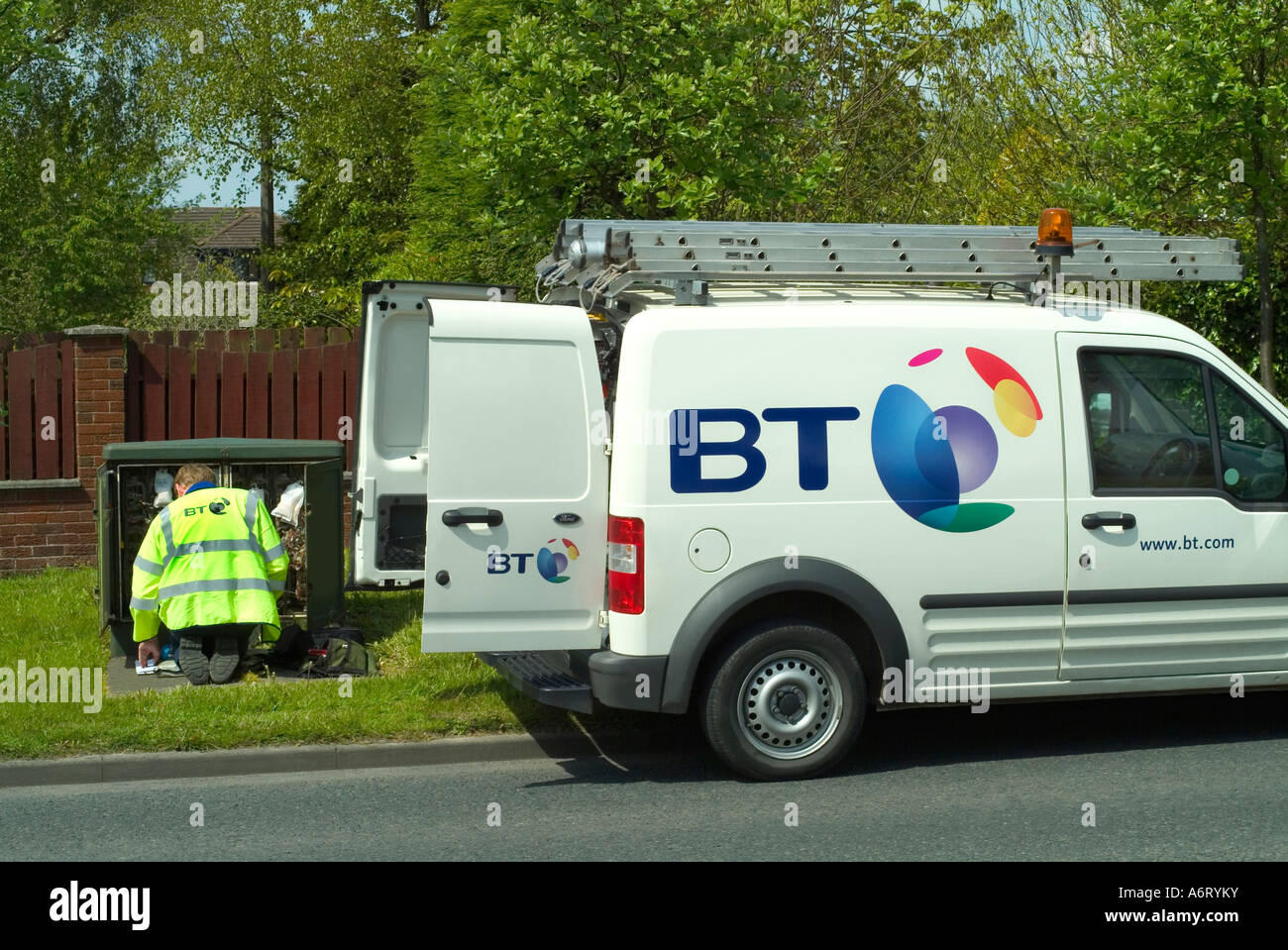 bt van & man carrying out repair at junction box Stock Photo - Alamy