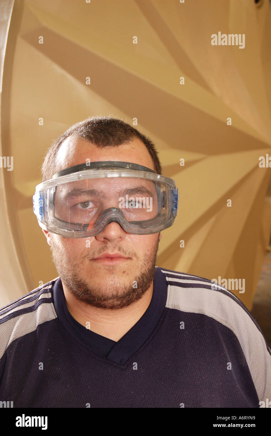 Factory worker wearing high impact safety goggles glasses Stock Photo ...