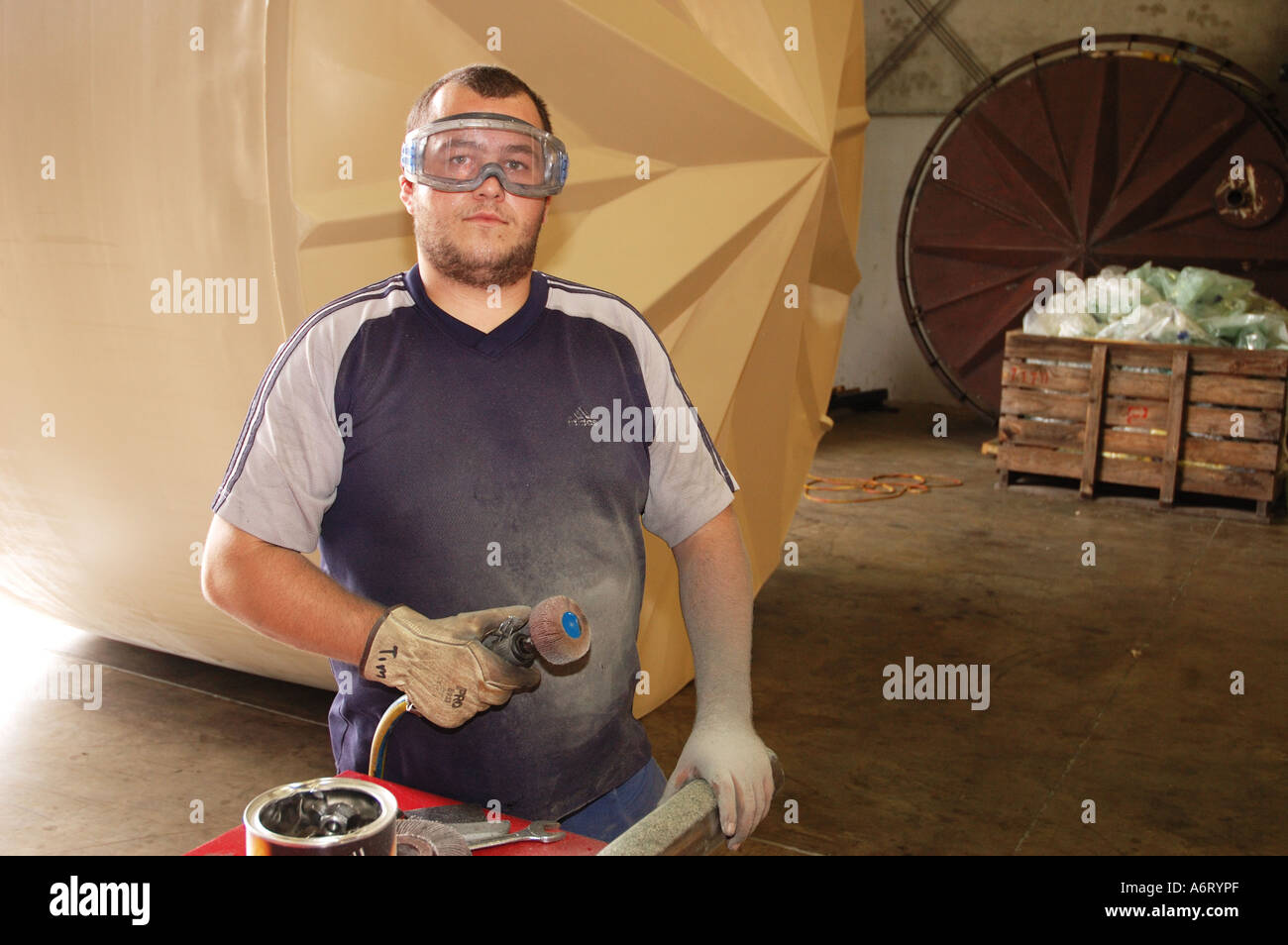 Factory worker wearing high impact safety goggles glasses Stock Photo ...