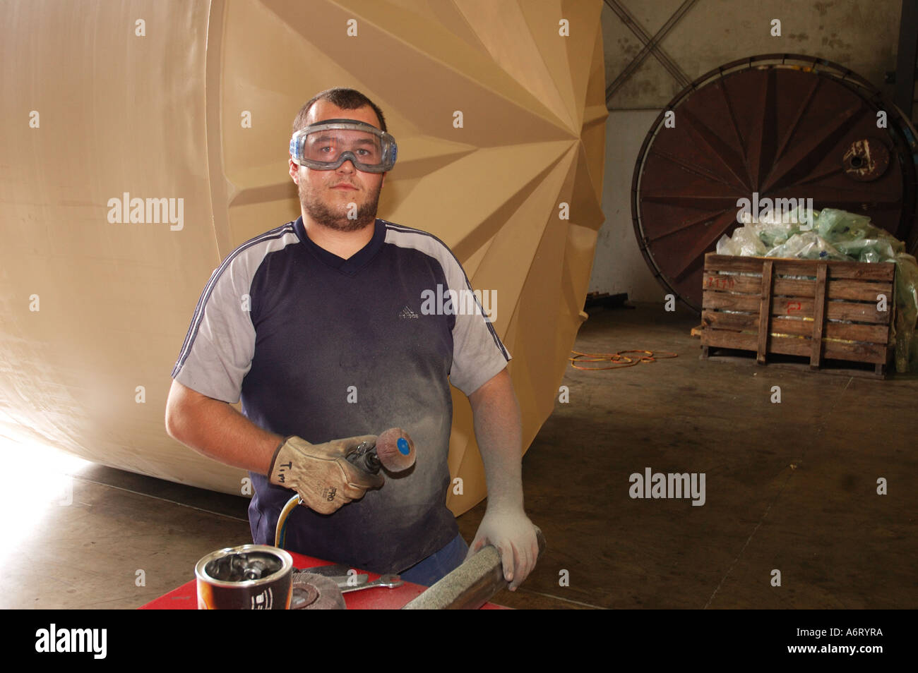 Factory worker wearing high impact safety goggles glasses Stock Photo ...
