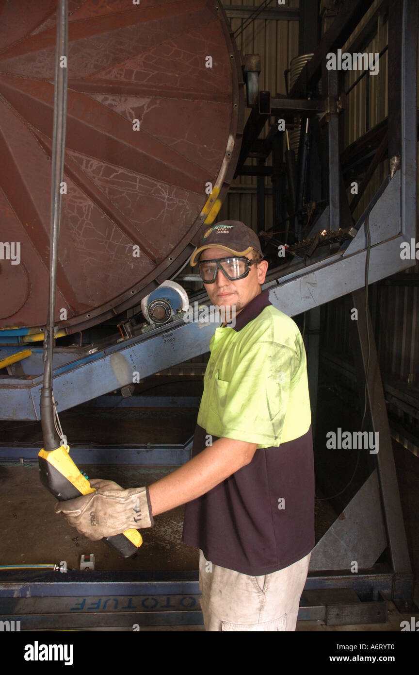 Factory worker wearing high impact safety goggles glasses Stock Photo ...