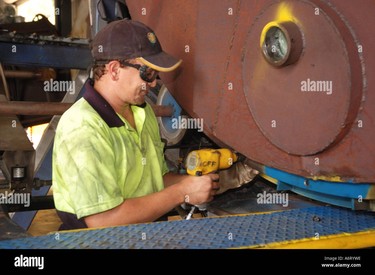 Factory worker wearing high impact safety goggles glasses Stock Photo ...