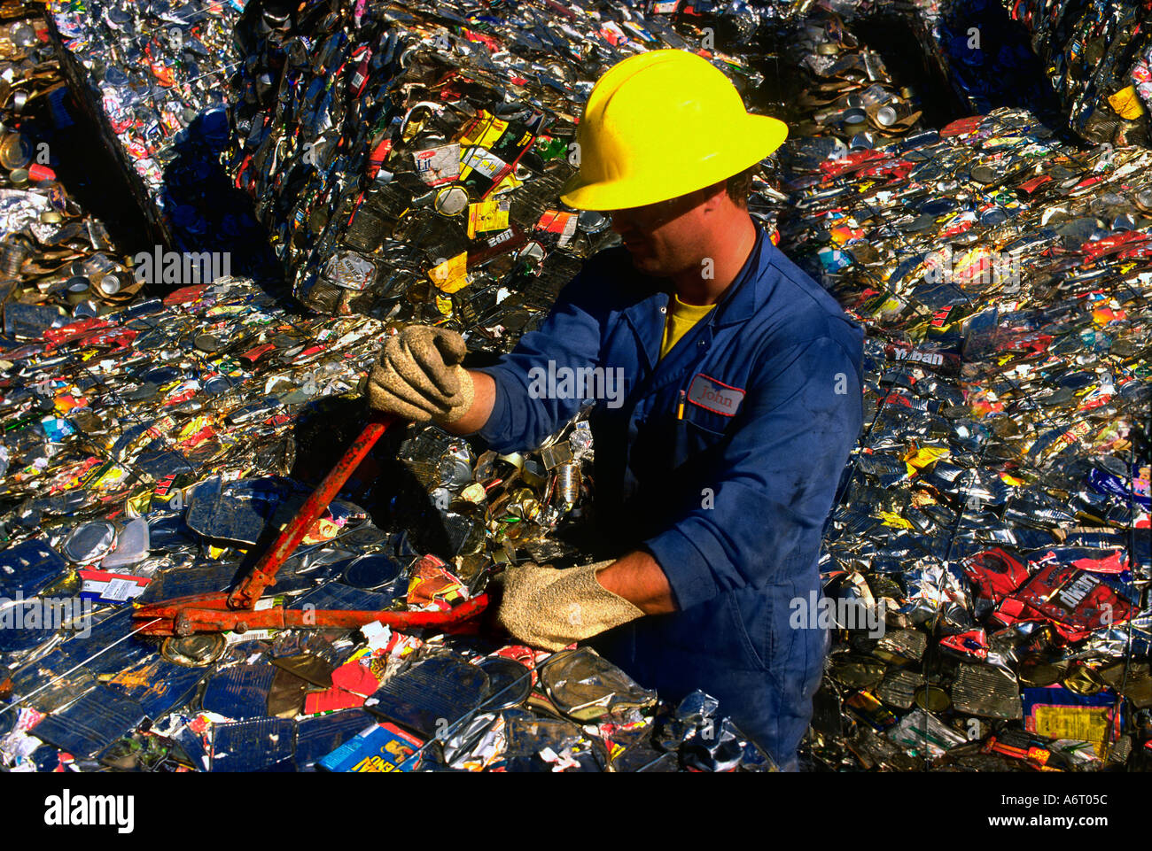 Worker collecting scrap metal hi-res stock photography and images - Alamy