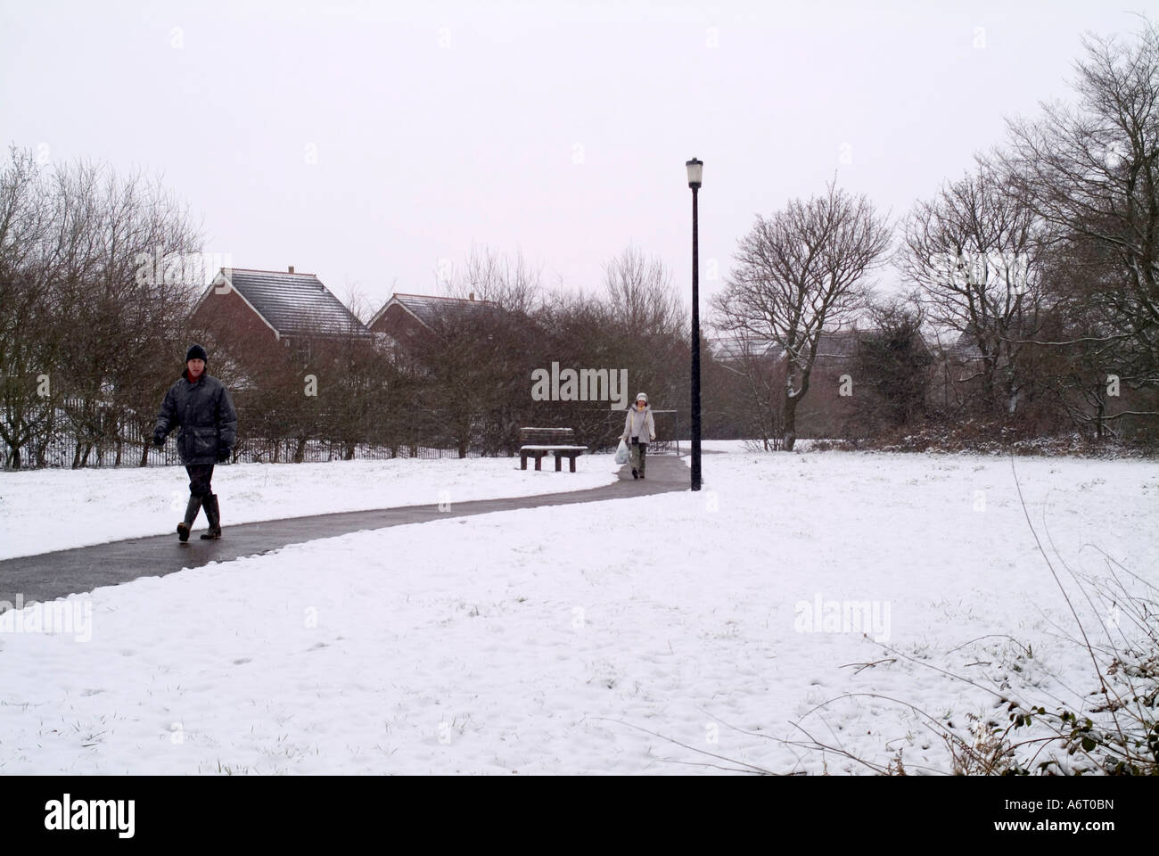 people walking in snow Stock Photo - Alamy