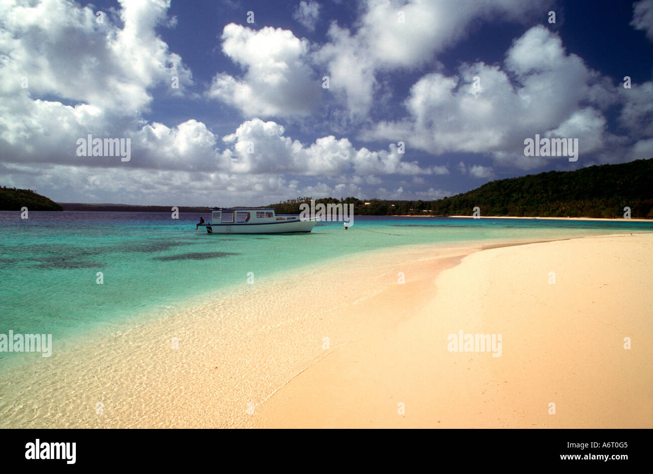 Boat anchored on deserted island Vavau Tonga Stock Photo - Alamy