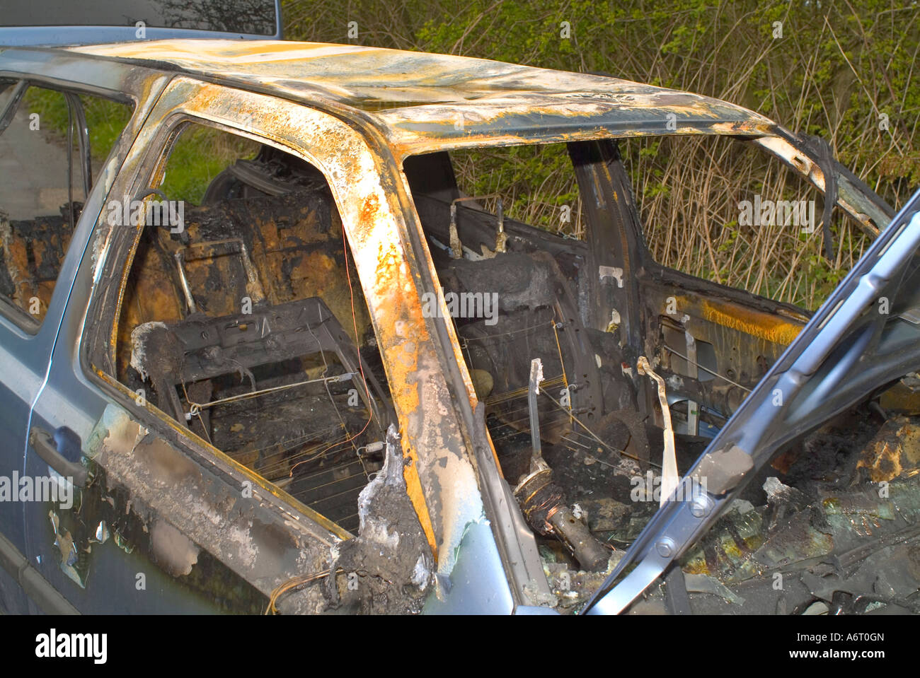 burnt out car wreck Stock Photo - Alamy