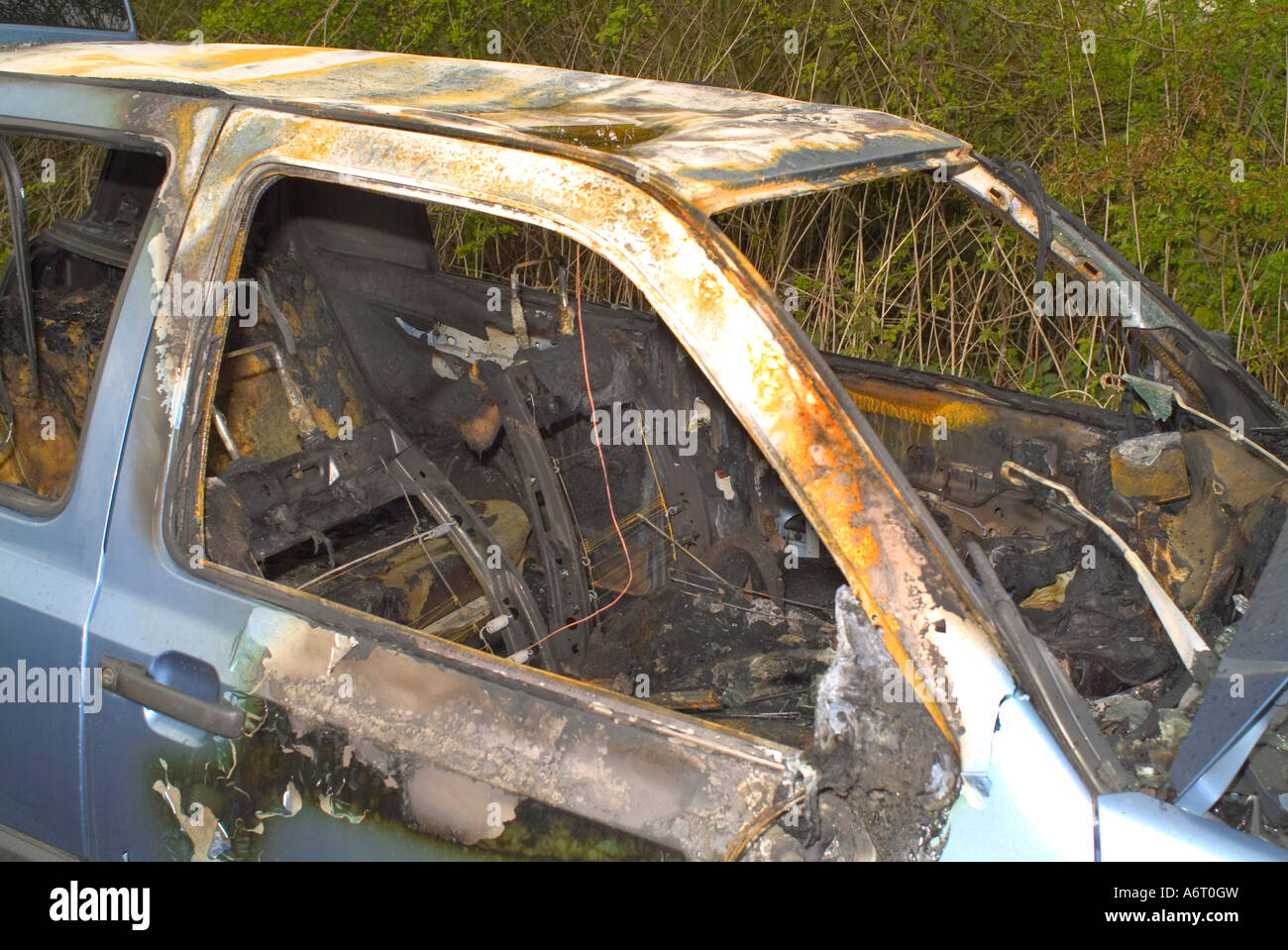 burnt out car wreck Stock Photo - Alamy