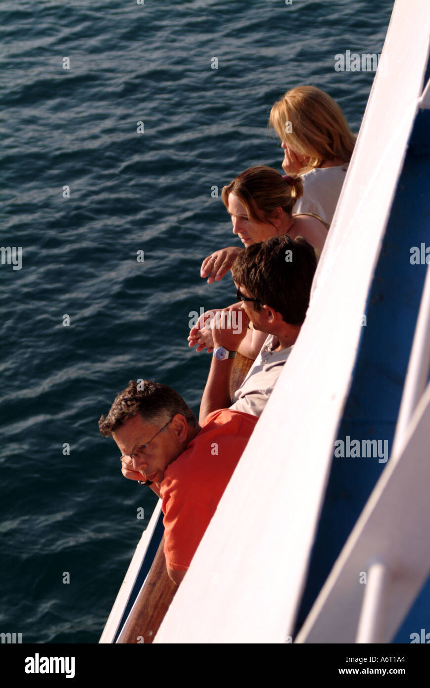 Passengers watching from docking Greek ferry Skiathos Greece Stock ...