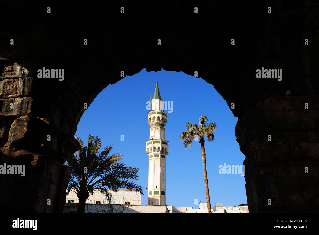 The minaret of Gurgi mosque looking through the Arch Of Marcus Aurelius ...