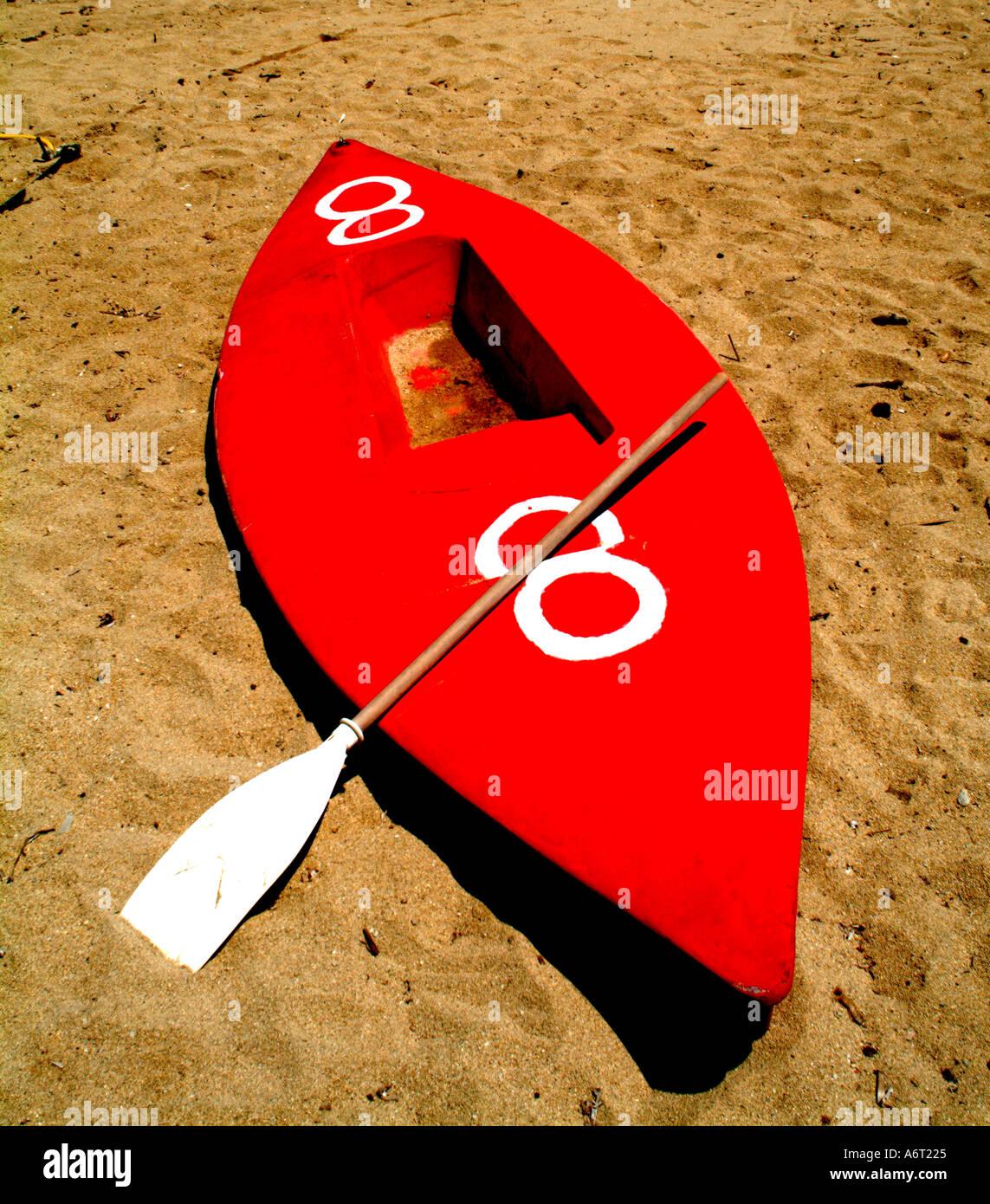Canoe on beach at Meghalos Aselinos beach Skiathos Greece Stock Photo ...
