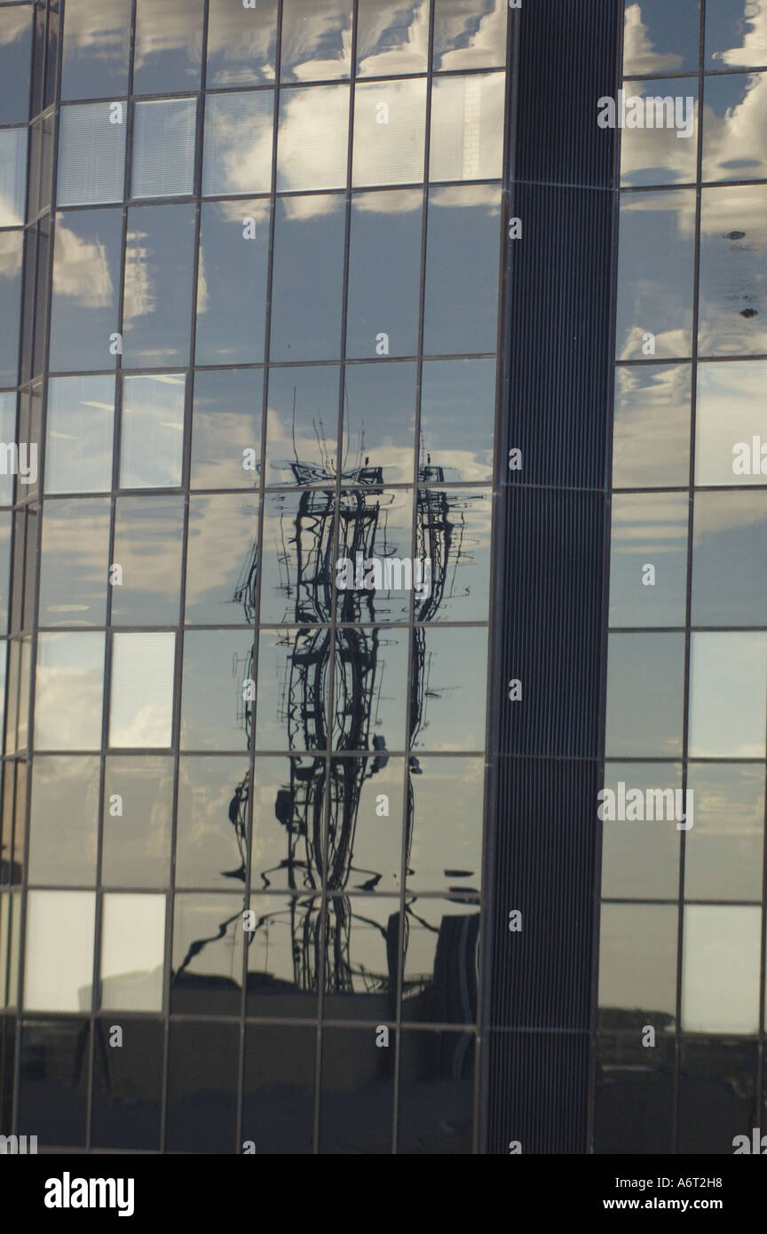 communication tower reflected in dull grey building inner city Stock ...