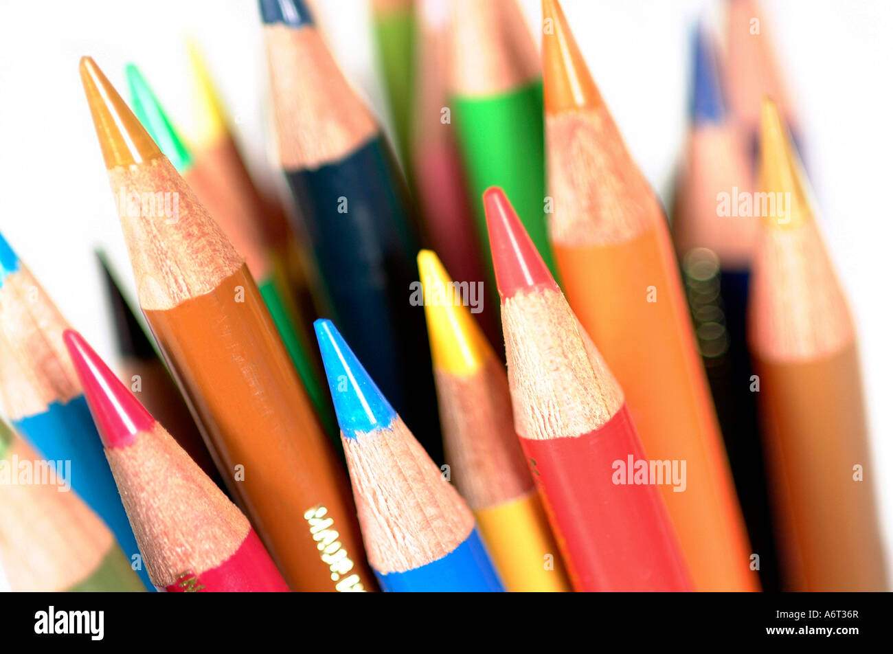 Coloured pencils in a glass Stock Photo - Alamy