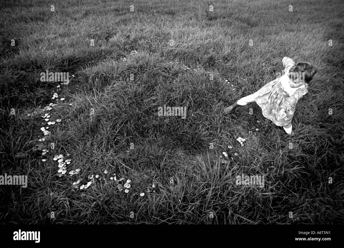 small girl dancing around fairy ring Stock Photo - Alamy